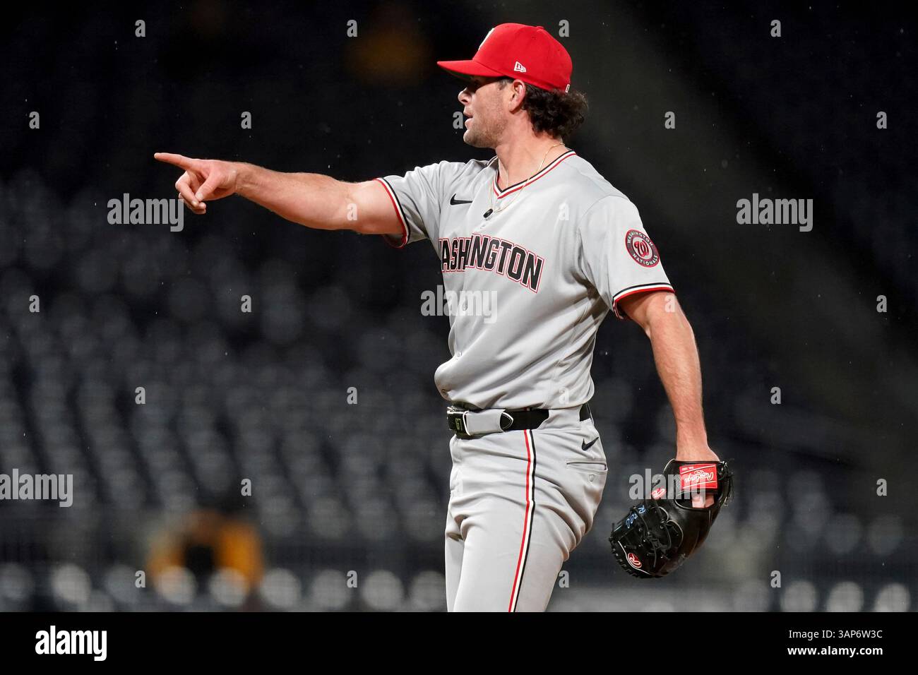Washington Nationals pitcher Kyle Finnegan reacts after getting the ...