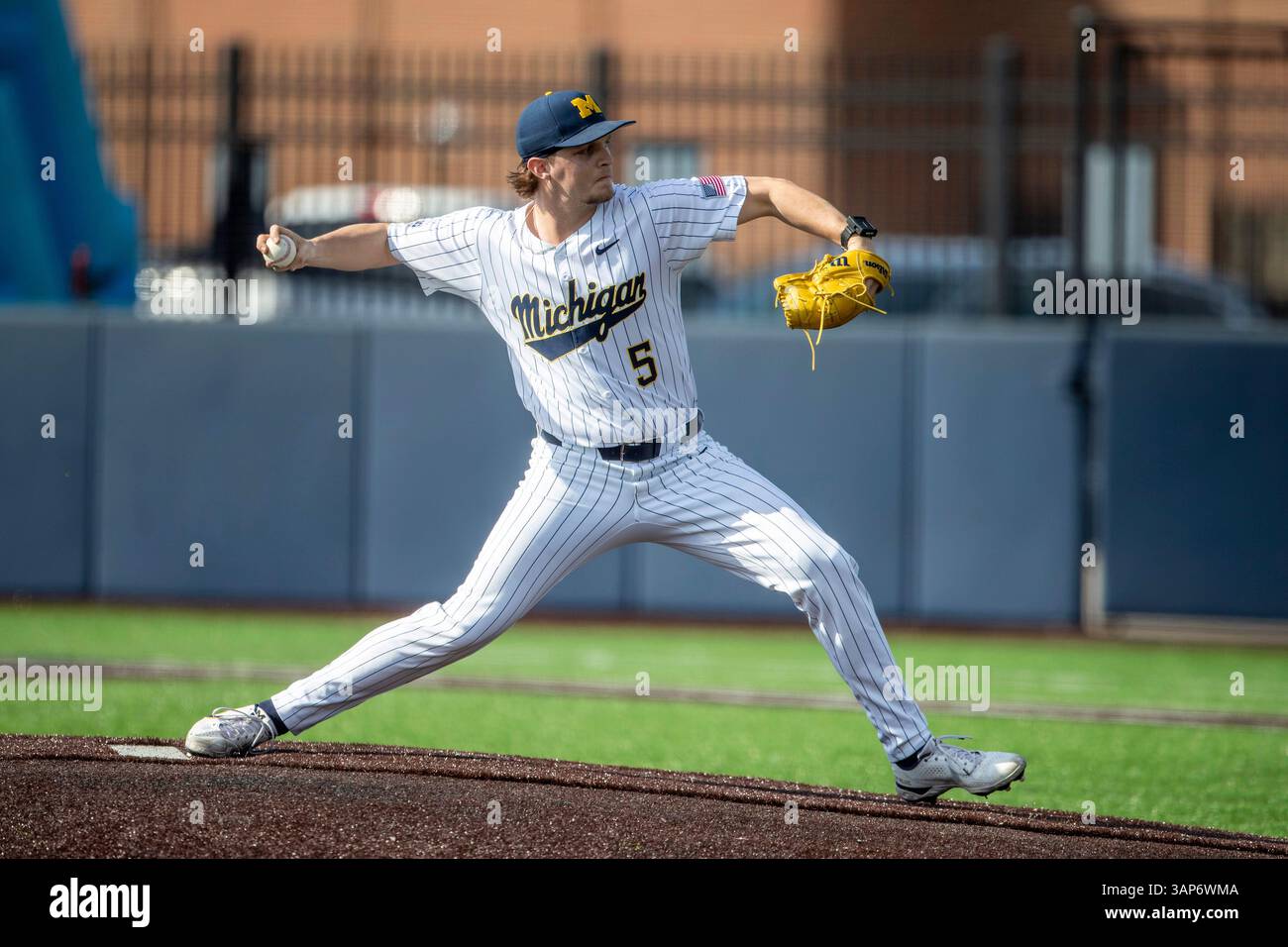 Michigan Wolverines pitcher David Lally Jr. (5) delivers a pitch to the ...