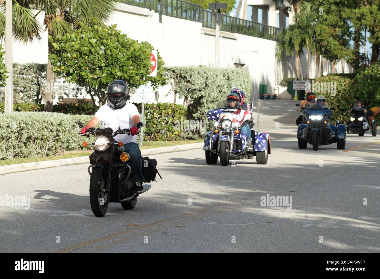 Group of motorcycle bikers on a city street in Florida, USA Stock Photo ...