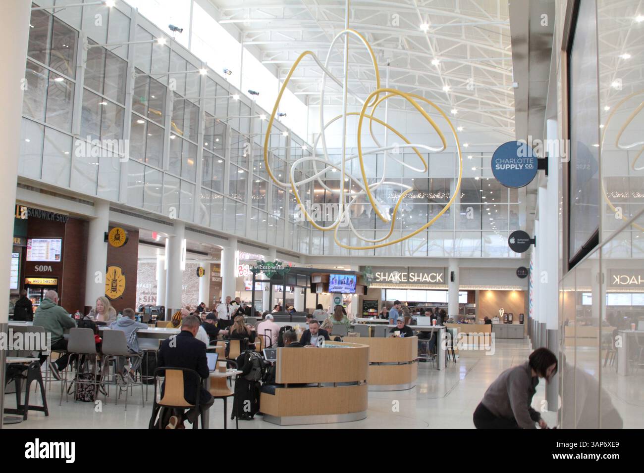 Charlotte, North Carolina, USA. Travelers inside Charlotte Douglas ...