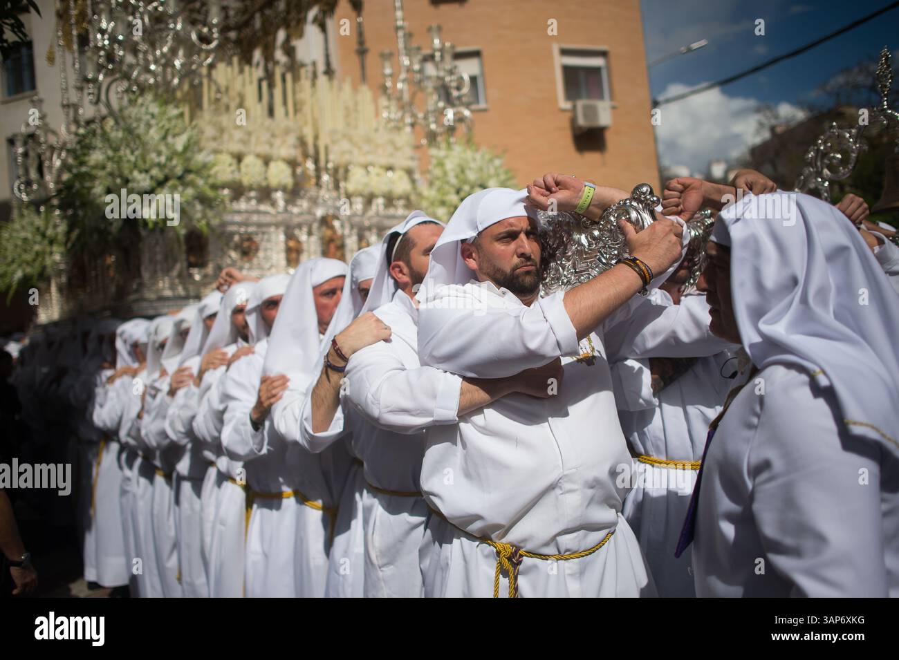 Penitents from ‘El Rocio' brotherhood are seen carrying the statue of ...