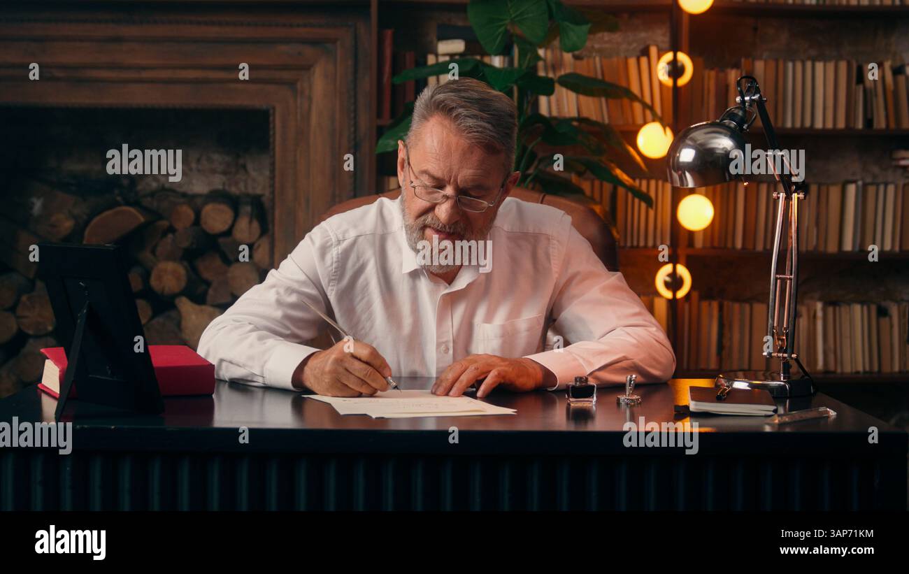 Old Caucasian man writing signing contract document paperwork papers ...