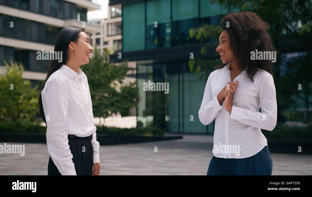African American Asian Korean women females together happy laughing ...