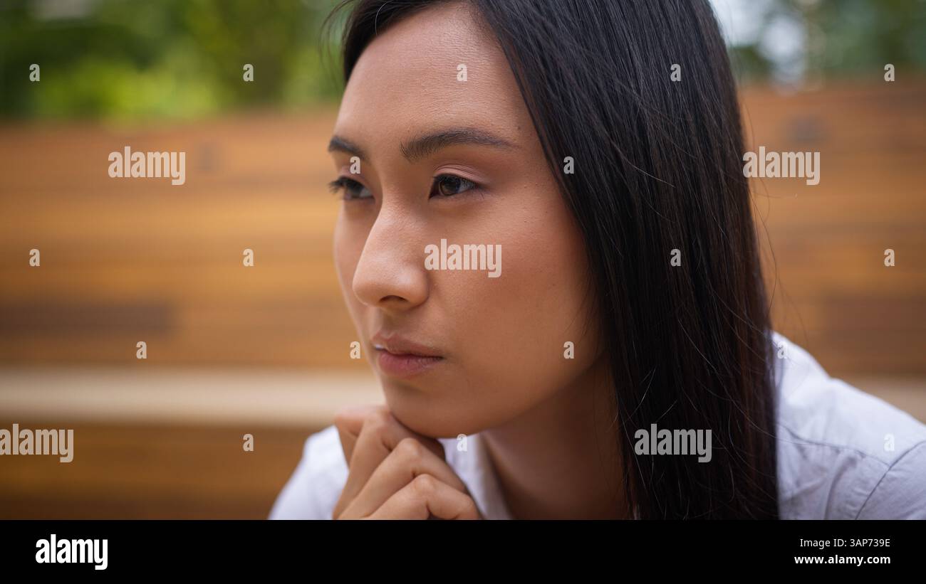 Sad pensive Asian Korean Chinese Japanese woman thinking female girl ...