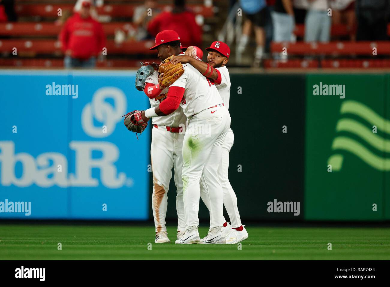 Members of the St. Louis Cardinals celebrate a team victory over the ...