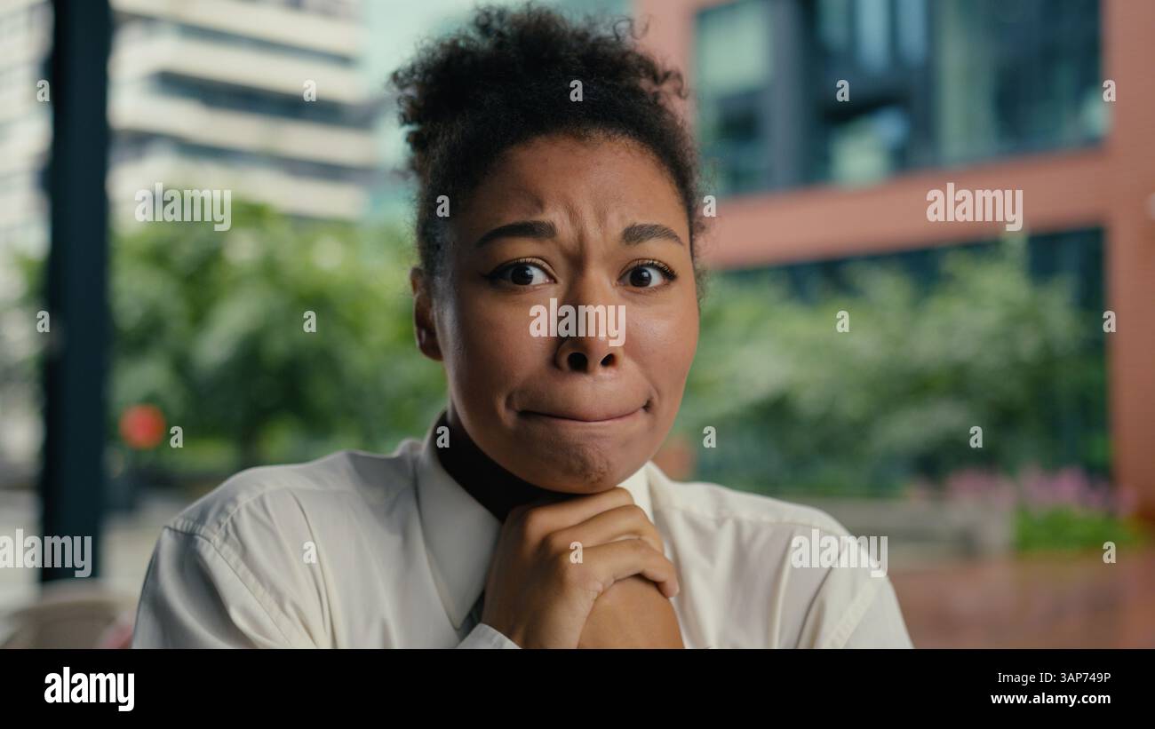 African American woman nervous biting lips female girl businesswoman ...