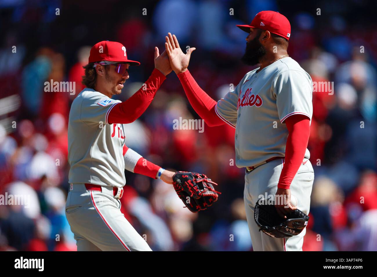 Jose Alvarado #46 of the Philadelphia Phillies high-fives Bryson Stott ...