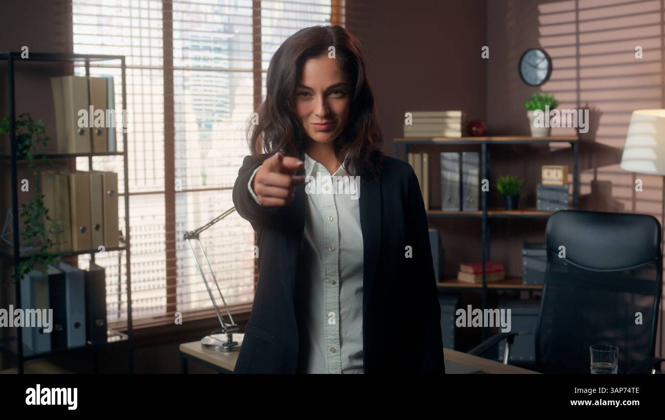 Caucasian woman pointing finger at camera inviting join choose ...