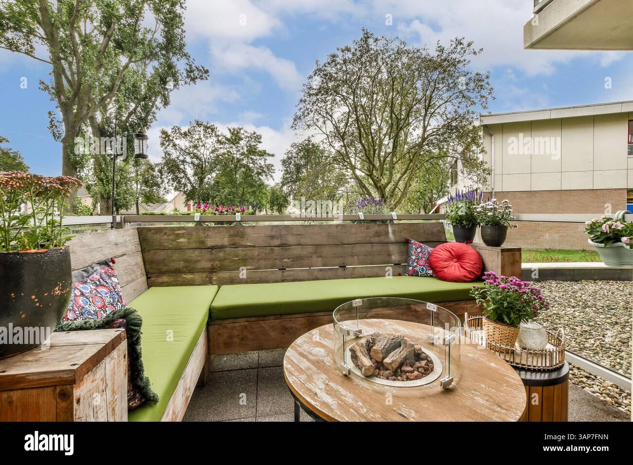 A beautifully designed outdoor lounge featuring comfortable seating ...
