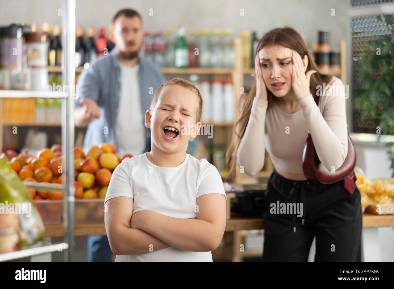 Screaming child grocery hi-res stock photography and images - Alamy