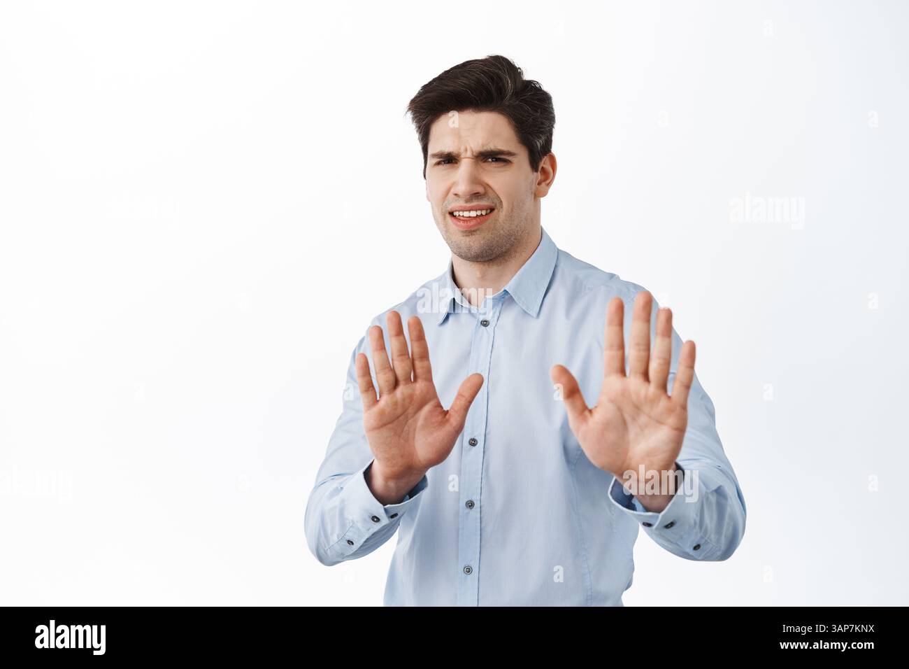 No thank you. Disgusted and reluctant man shaking hands to refuse ...