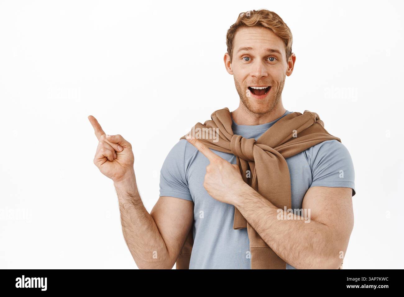 Image of happy ginger guy with fit and sporty body, say wow, smiling ...