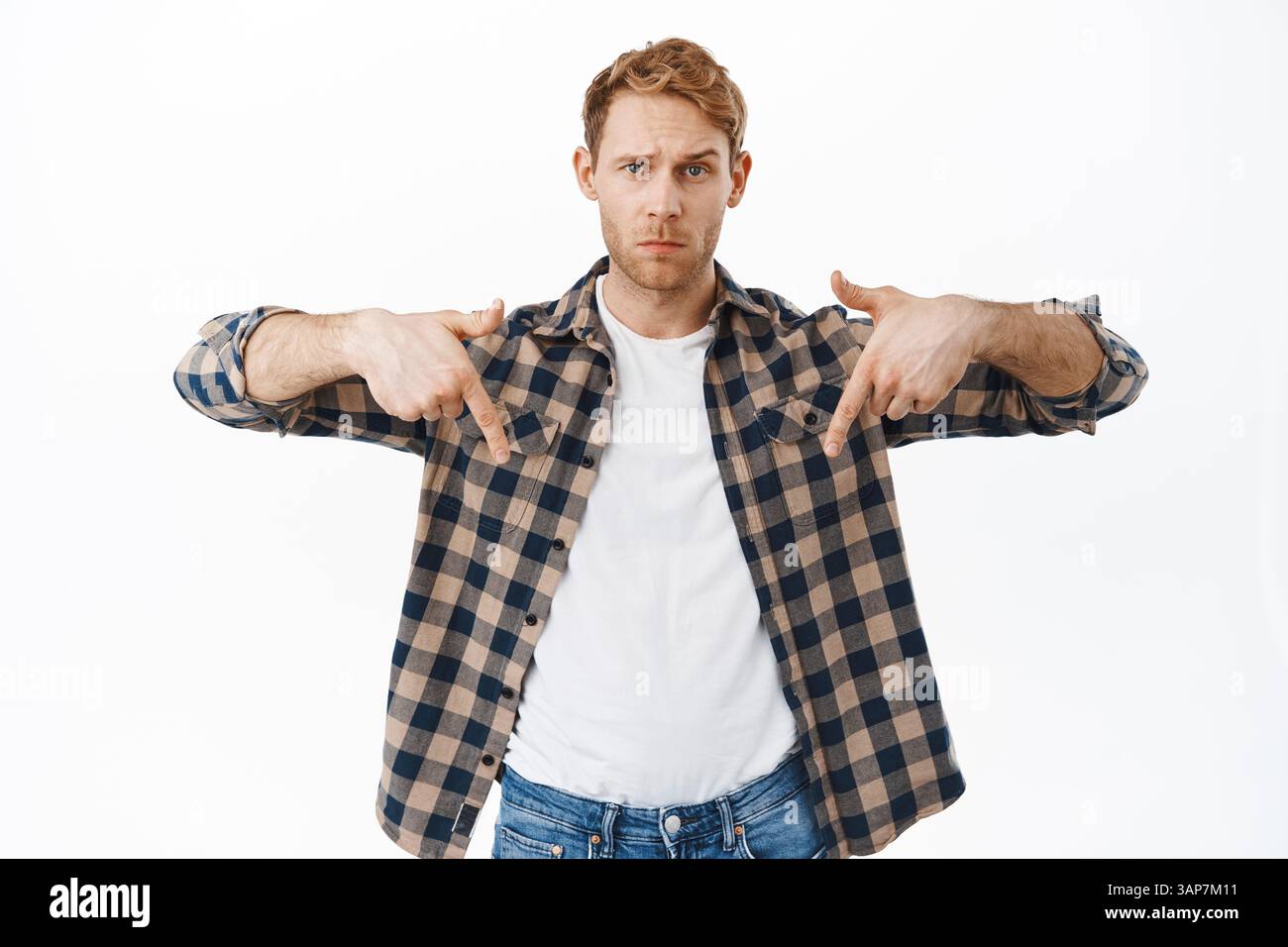 Doubtful man asking your opinion, what do you think. Redhead guy ...