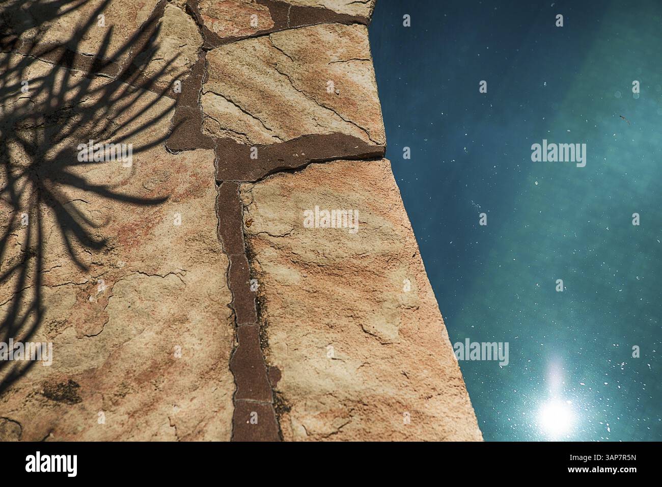 Pool edge of a pool in Argentina Stock Photo - Alamy