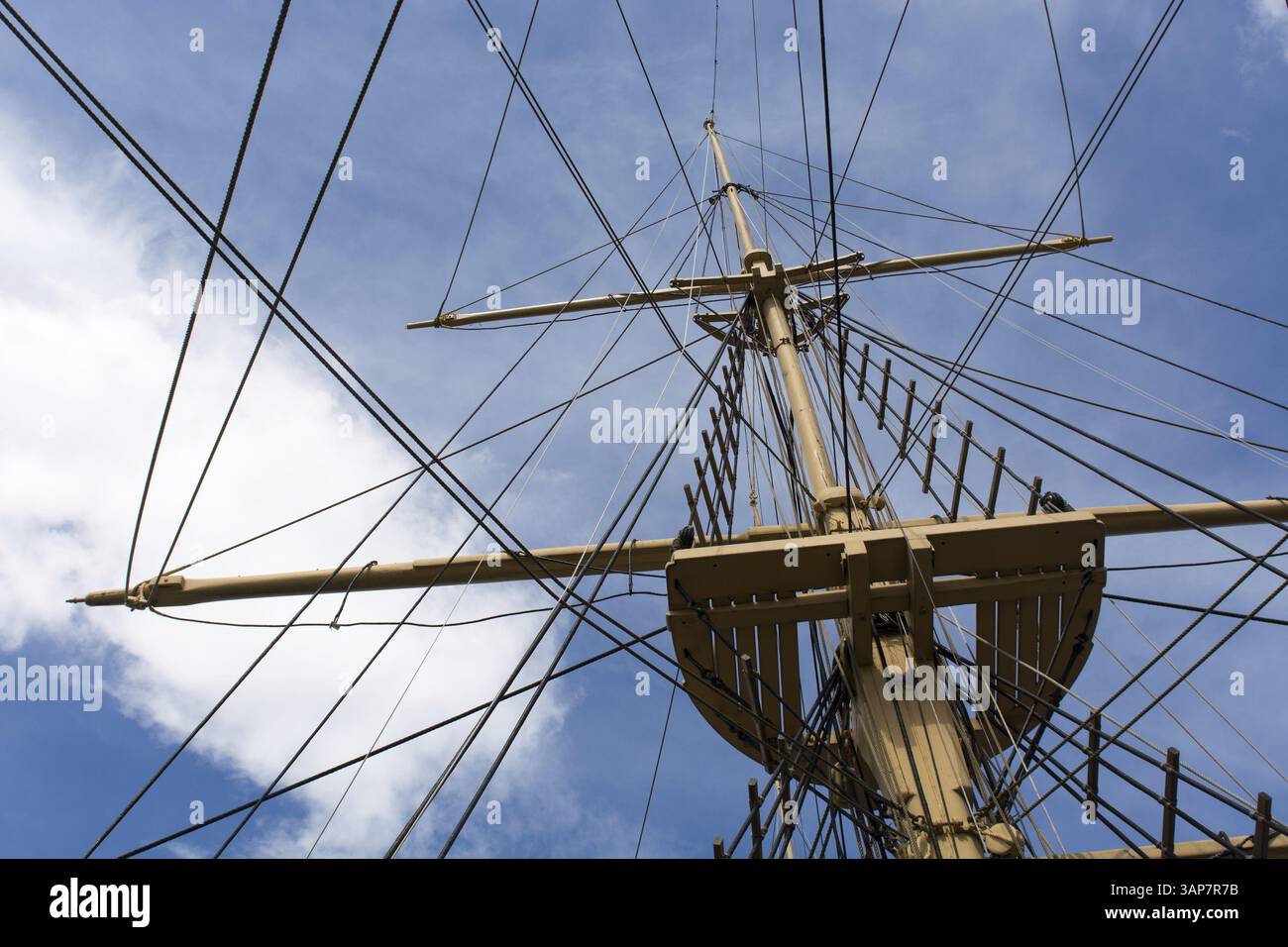 Mast and rigging of a big old sailing ship in front of a blue sky Stock ...