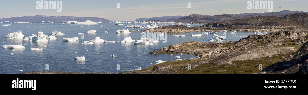 A breathtaking coastal landscape near Ilulissat, Greenland, featuring ...