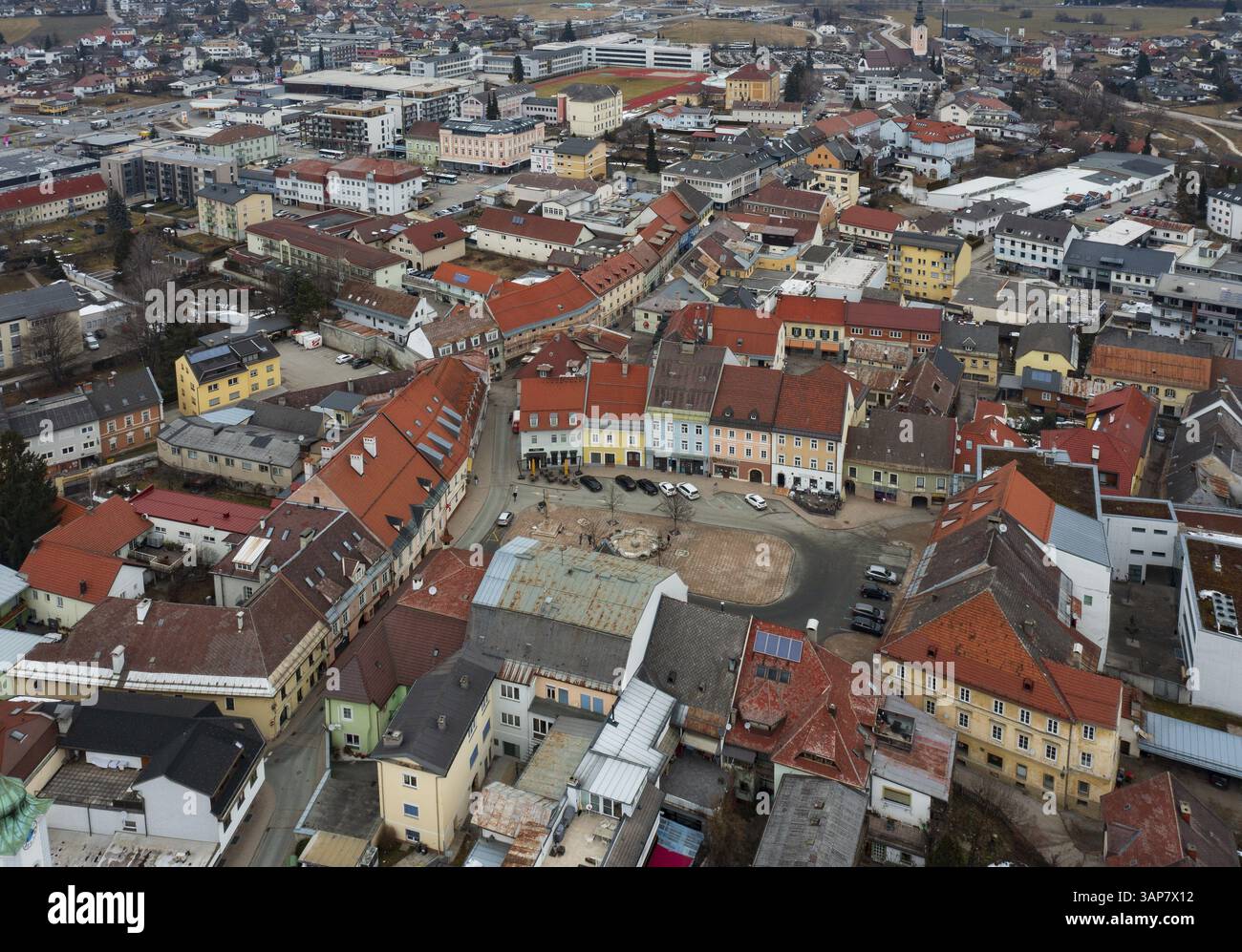 Drone shot, townscape with residential buildings and shopping centres ...