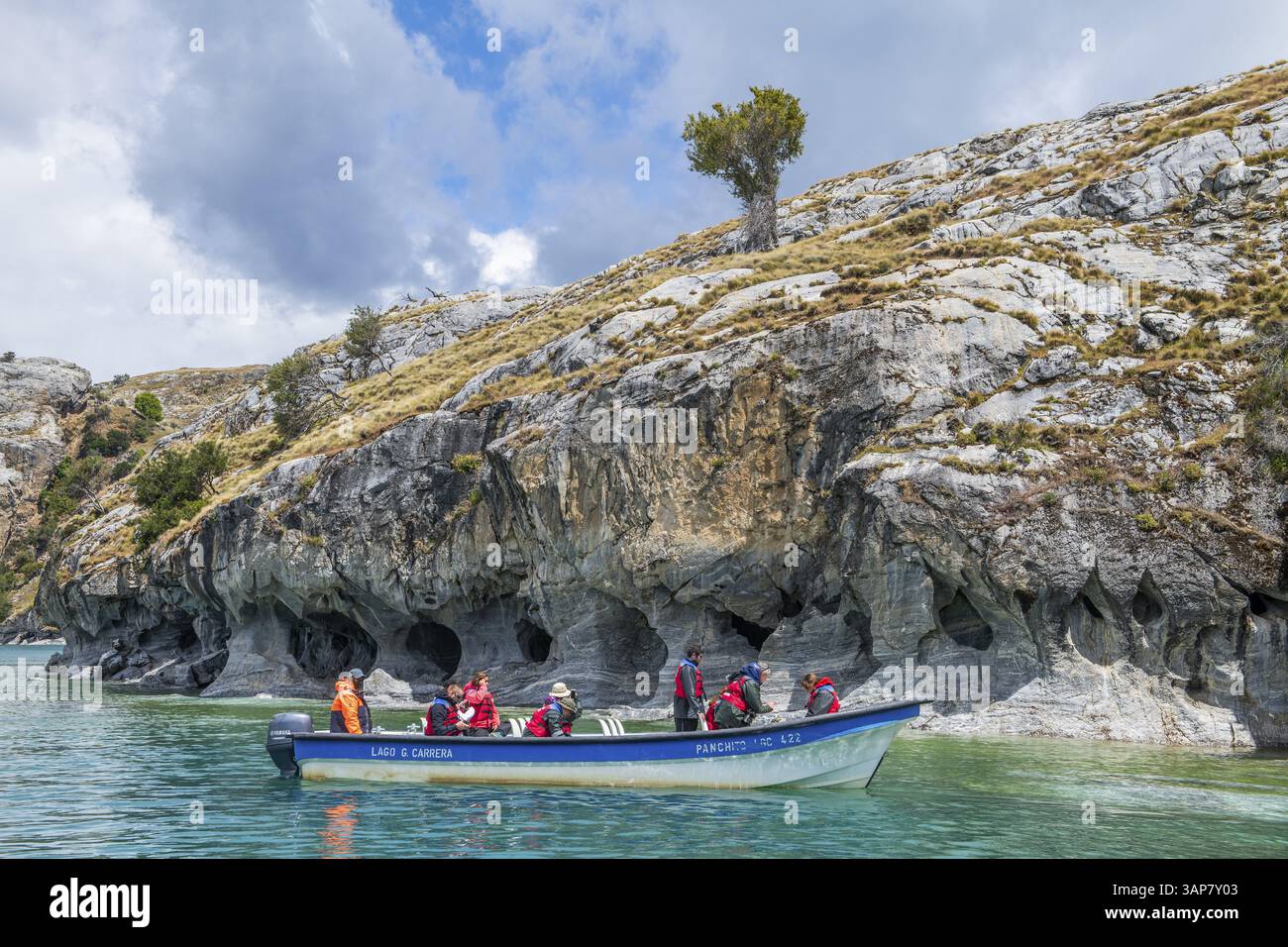 Excursion boat in front of the marble caves Capillas de Marmol, Lago ...