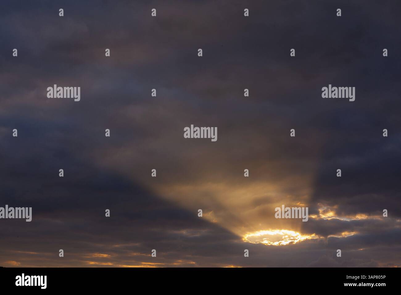 Texture sky dark clouds with cloud hole and translucent sun Stock Photo ...