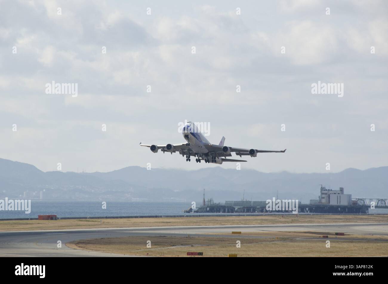 Boeing 747 plane starting at Kansai international airport in Osaka ...