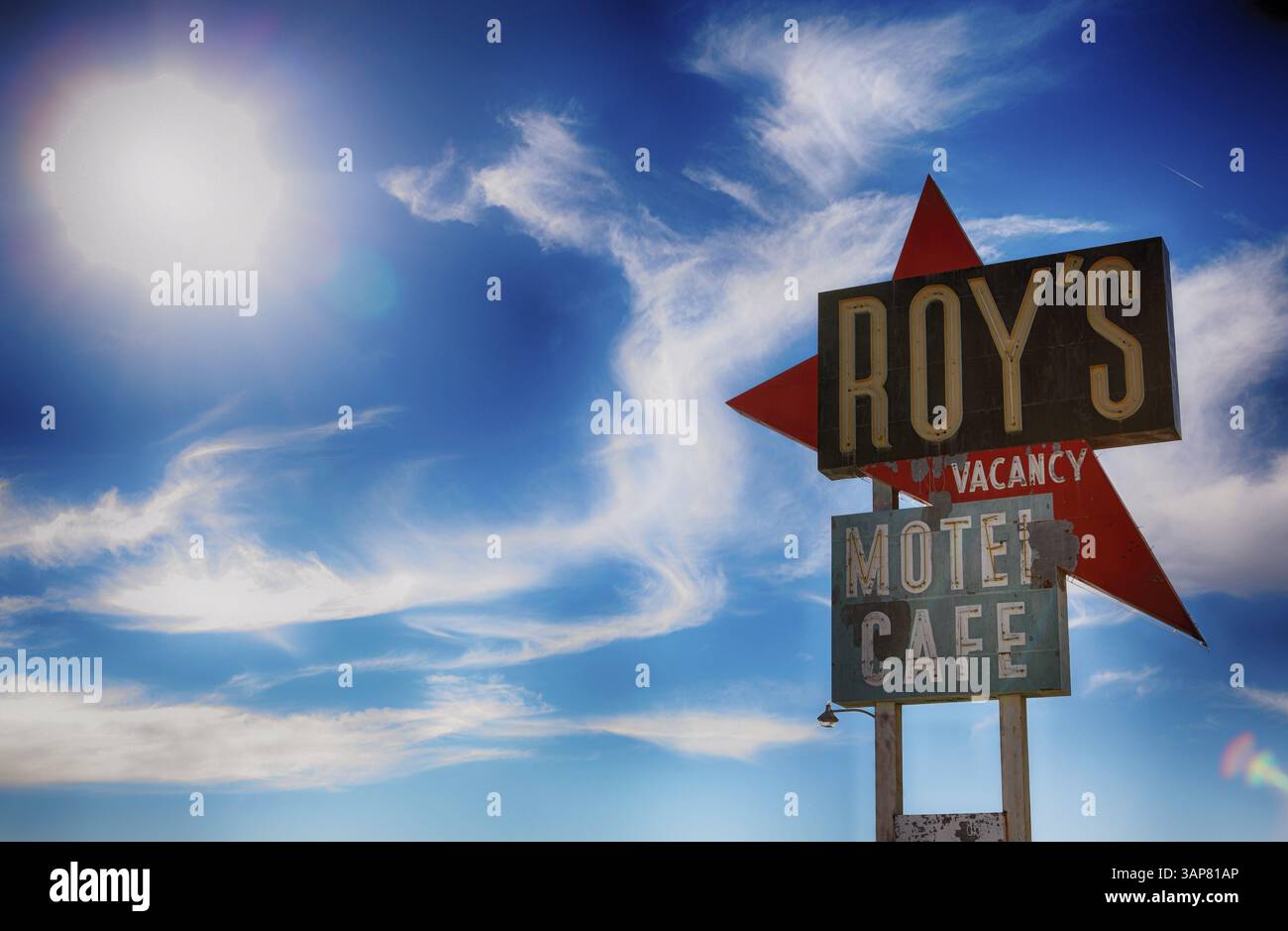 Roy's Motel sign in 60s style rises into the sky Stock Photo - Alamy