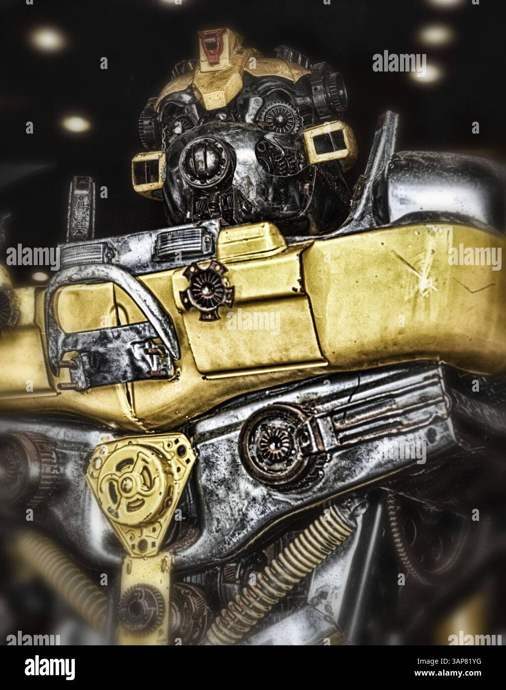 A figure made from scrap metal that resembles a Transformer Stock Photo ...