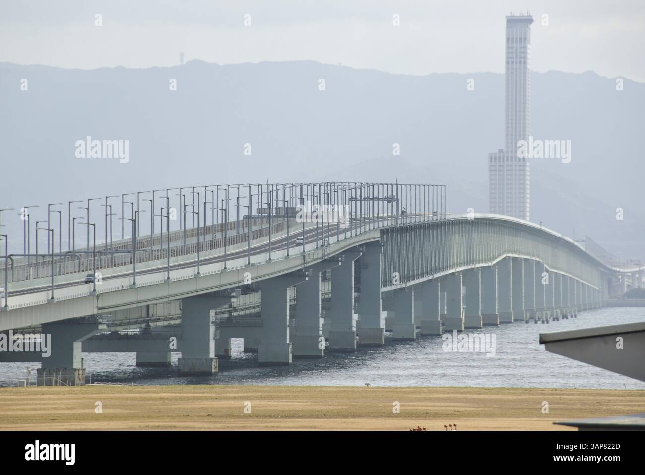 Bridge connecting kansai international hi-res stock photography and ...
