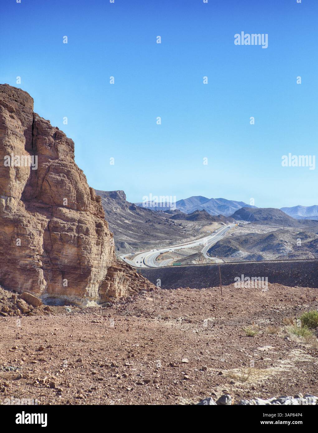 An empty road through the mountains of Nevada near the legendary Hoover ...