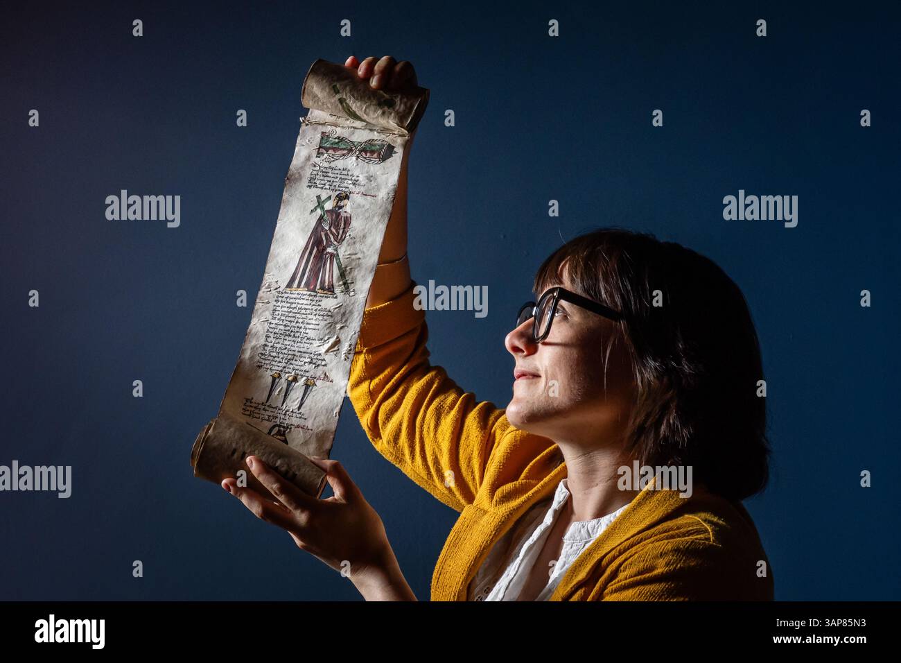 Special collections manager dr hannah thomas with a replica of the bar ...