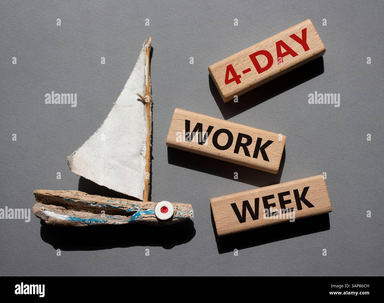 4-day work week symbol. Concept words 4-day work week on wooden blocks ...