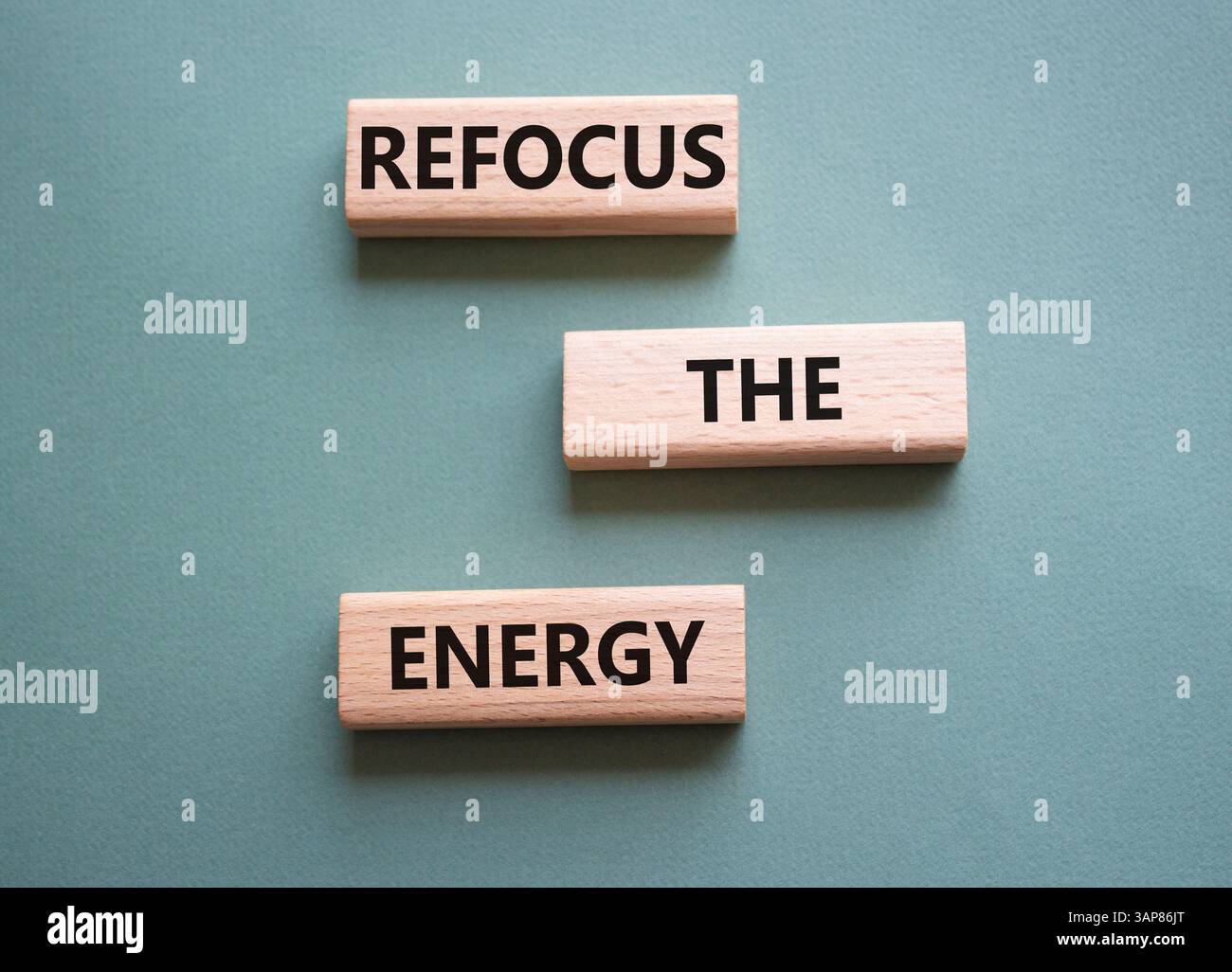 Refocus the Energy symbol. Concept word Refocus the Energy on wooden ...