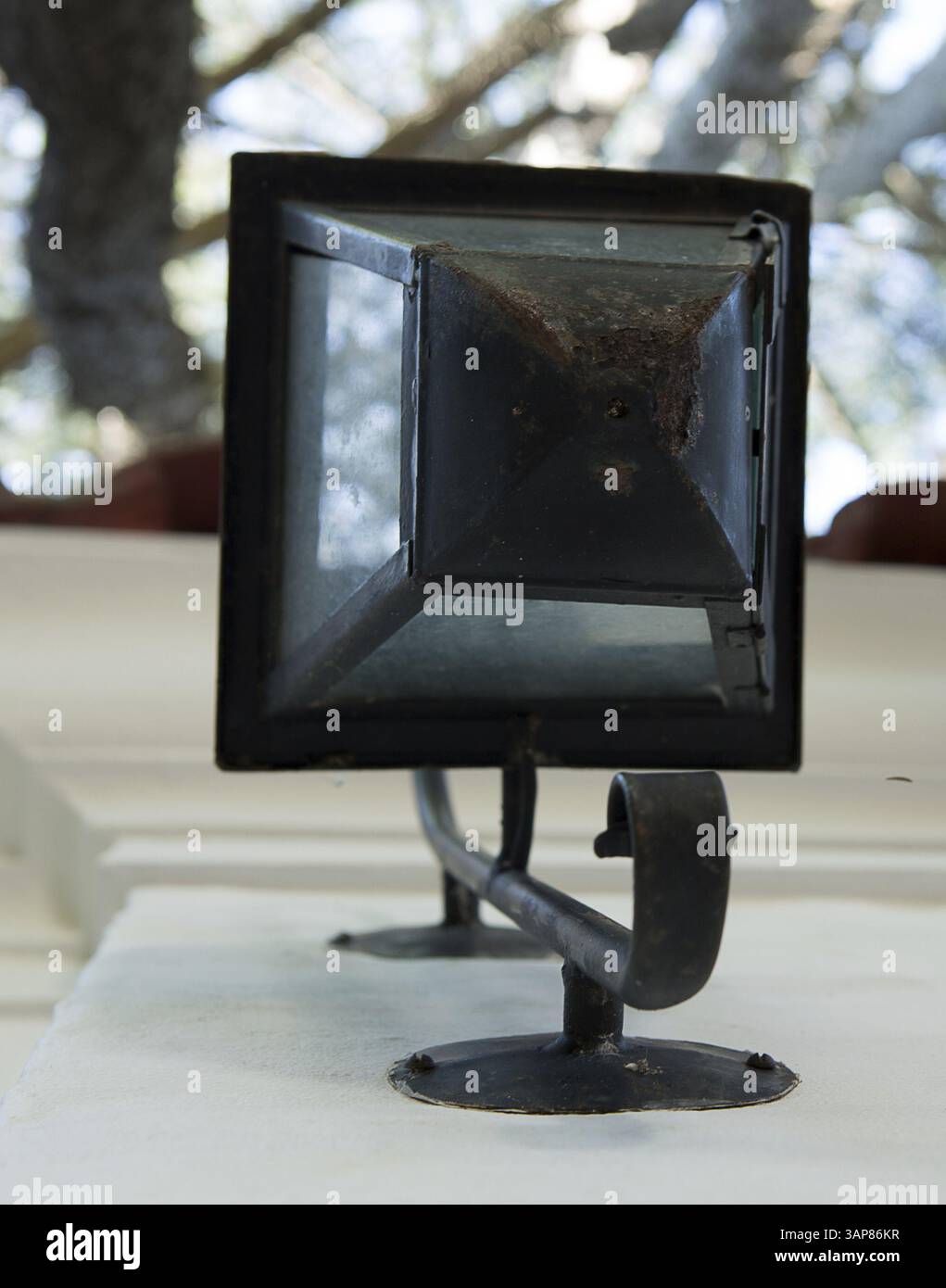 Outdoor lamp seen from below in a backyard in Buenos Aires, Argentina ...