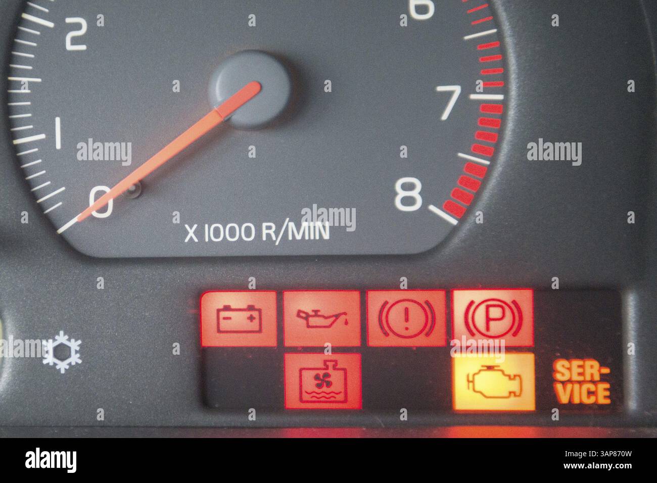 Dashboard signs in a car closeup with grey background Stock Photo - Alamy