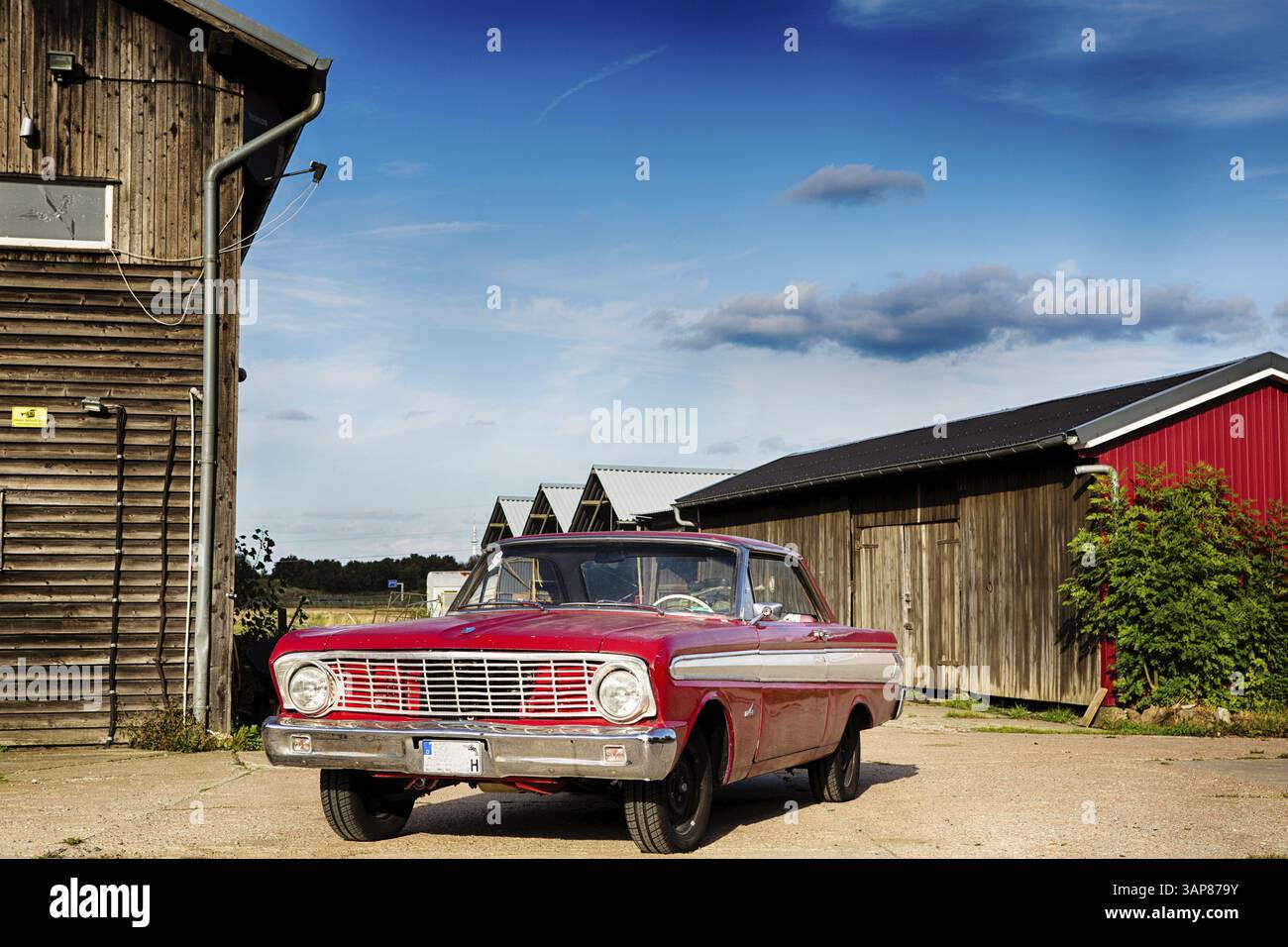 Red Ford Falcon Futura in a yard in Hamburg, 2019 Stock Photo - Alamy