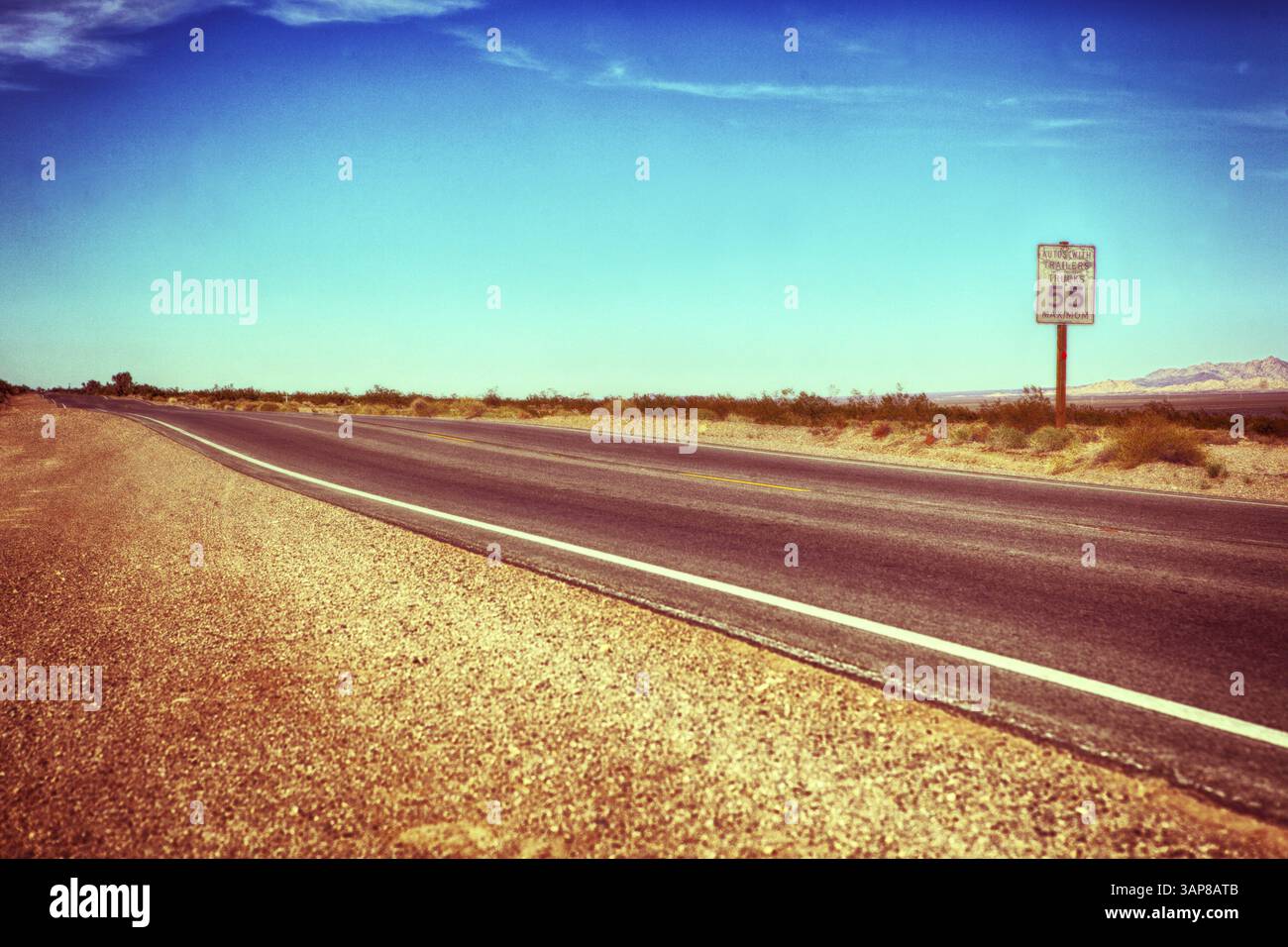 A deserted country road through the California desert, USA, North ...