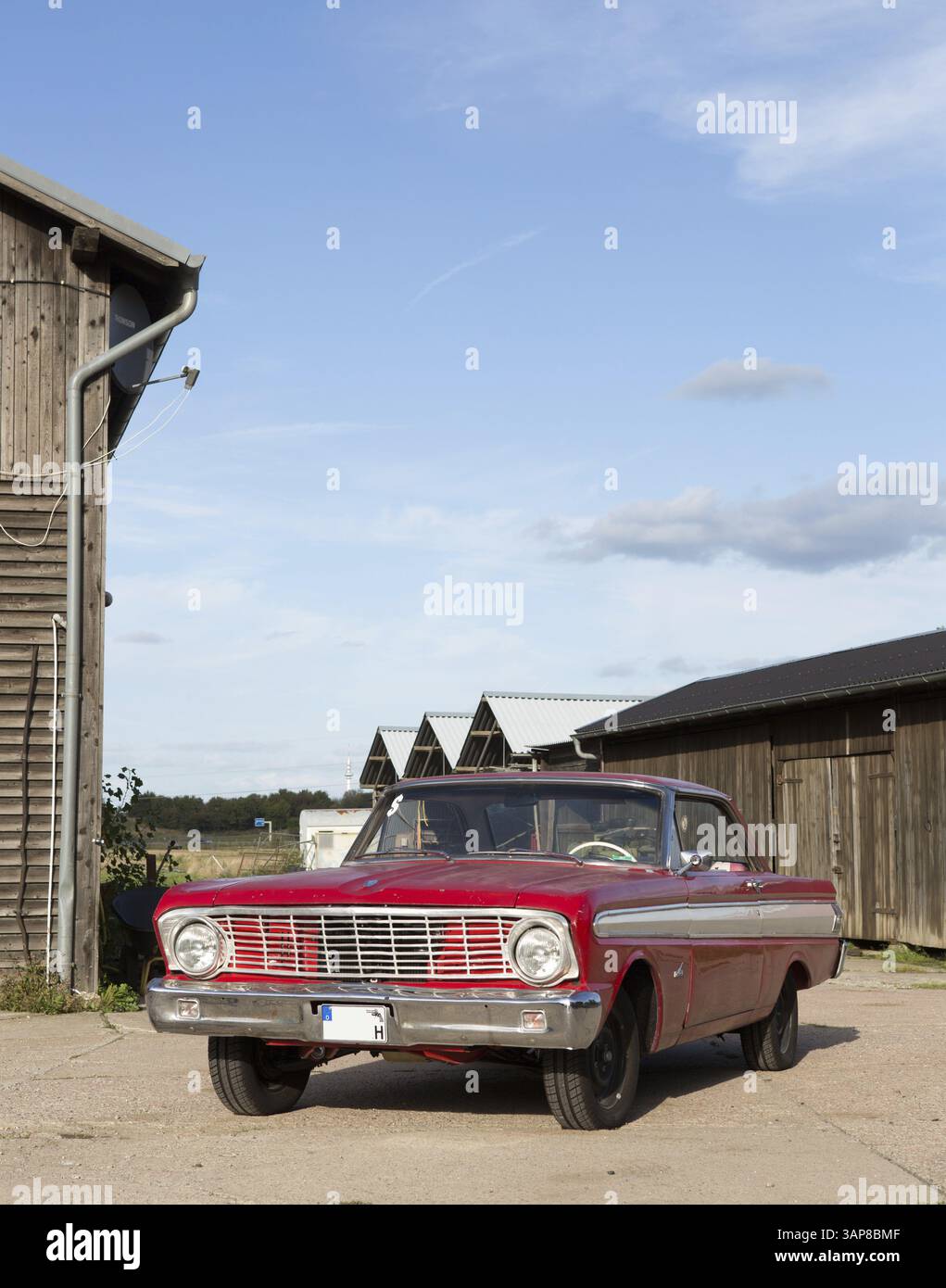 Red Ford Falcon Futura in a yard in Hamburg, 2019 Stock Photo - Alamy