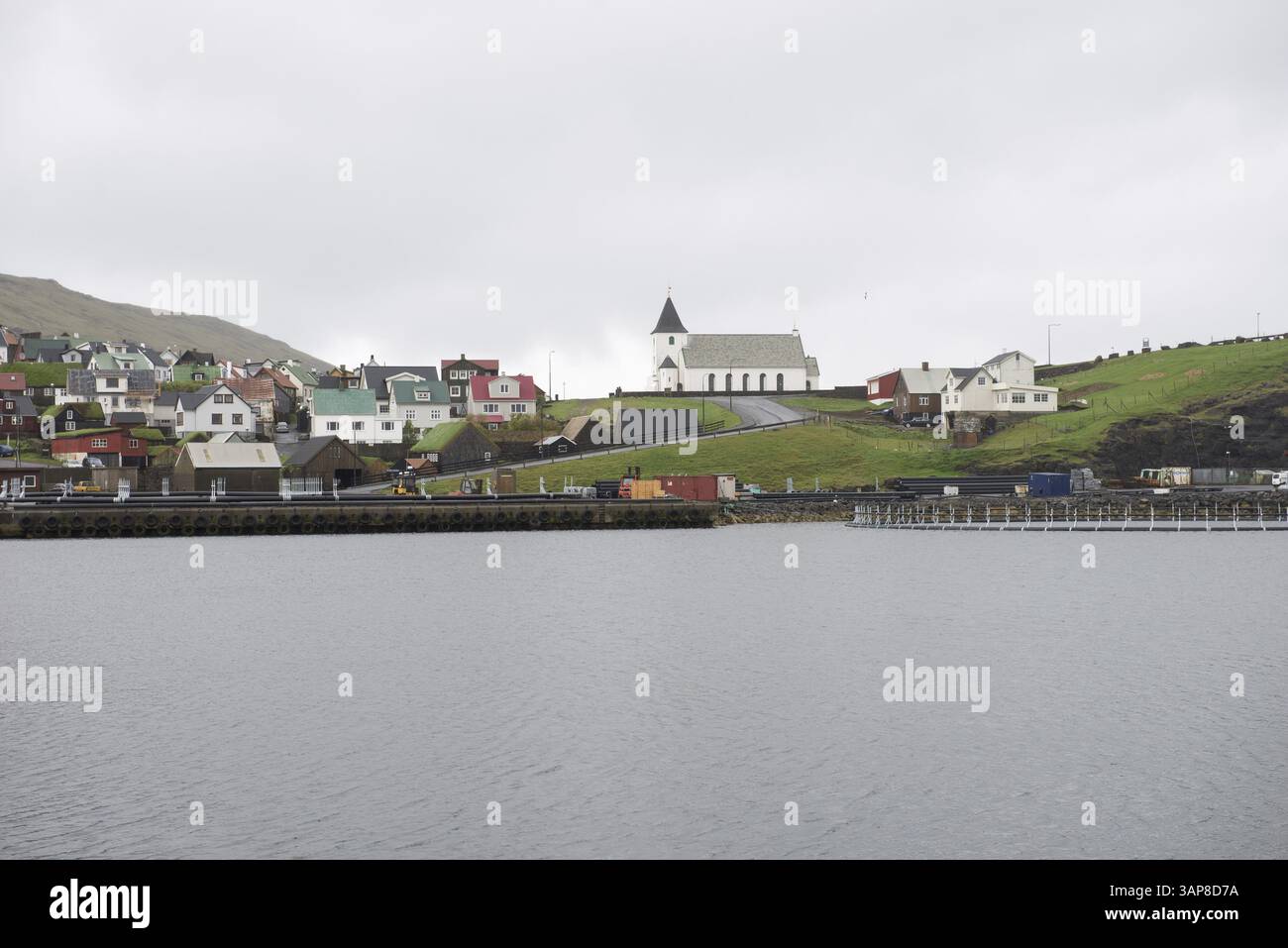 The village of Eidi on the Faroe Islands with church and harbor, Eidi ...