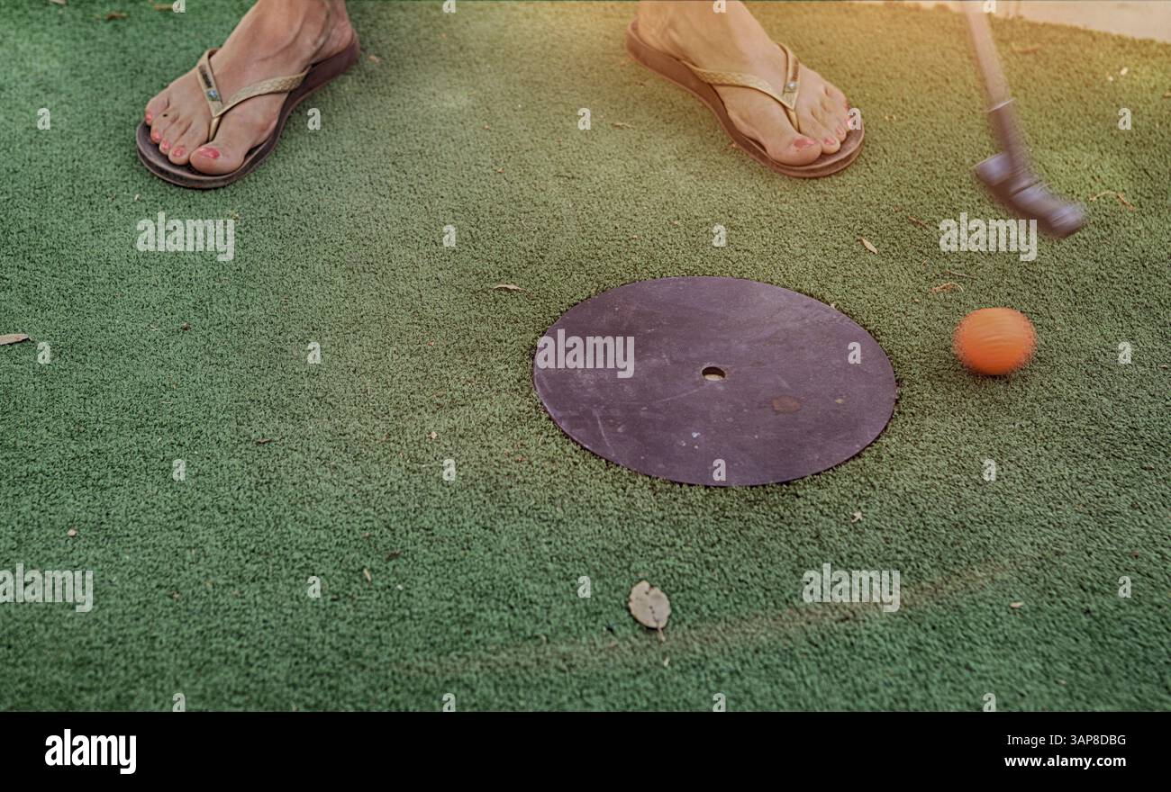 Tee off at mini golf Stock Photo - Alamy