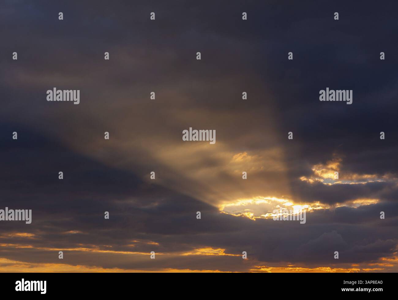Texture sky dark clouds with cloud hole and translucent sun Stock Photo ...