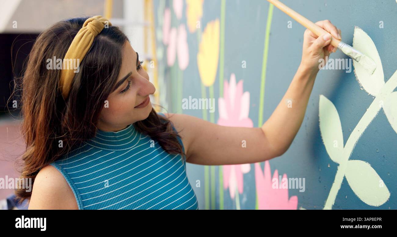 Woman, smile and painting in city for mural art, creative wall and ...