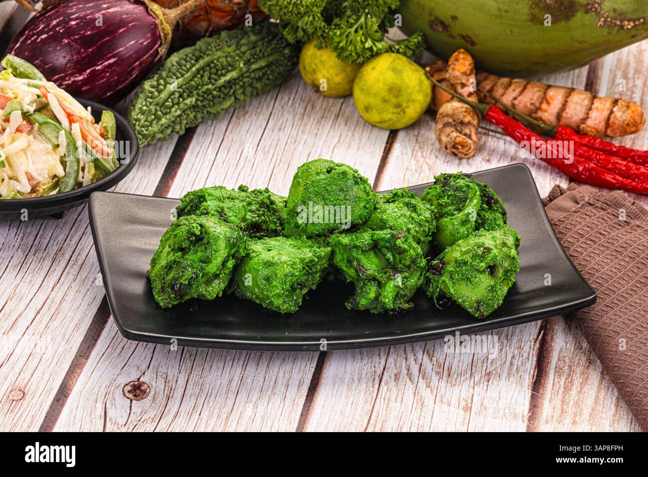 Indian green chicken mint tikka barbecue Stock Photo - Alamy