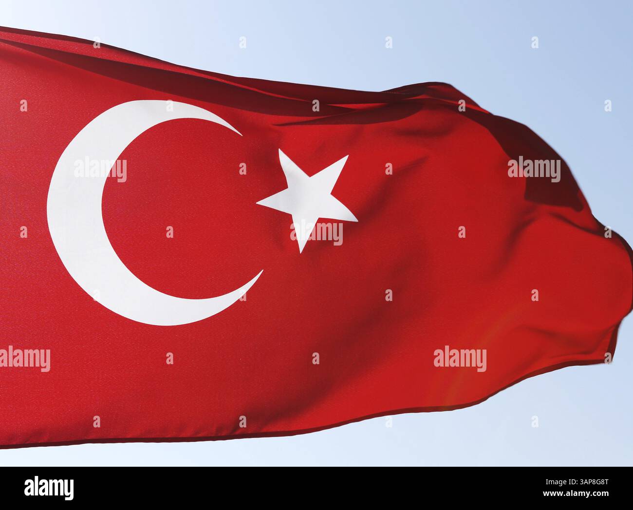 The Turkish flag flies in the sunlight Stock Photo - Alamy