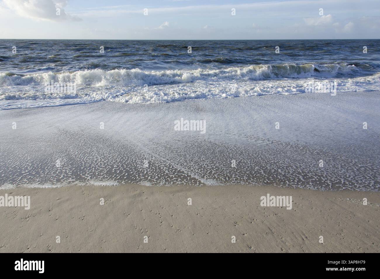 Beach at the North Sea on the Island Sylt in Germany with waves and ...