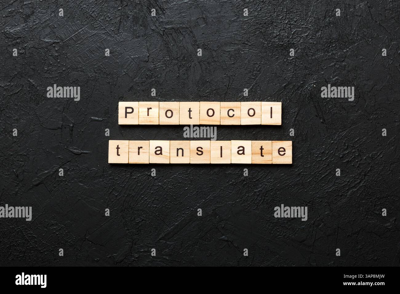PROTOCOL translate word written on wood block. PROTOCOL translate text ...
