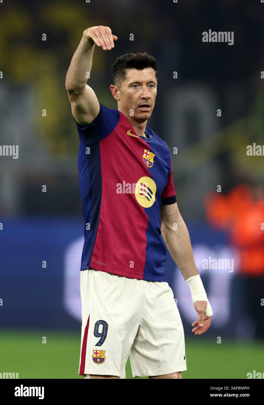 DORTMUND, GERMANY - APRIL 15: Robert Lewandowski of FC Barcelona reacts ...