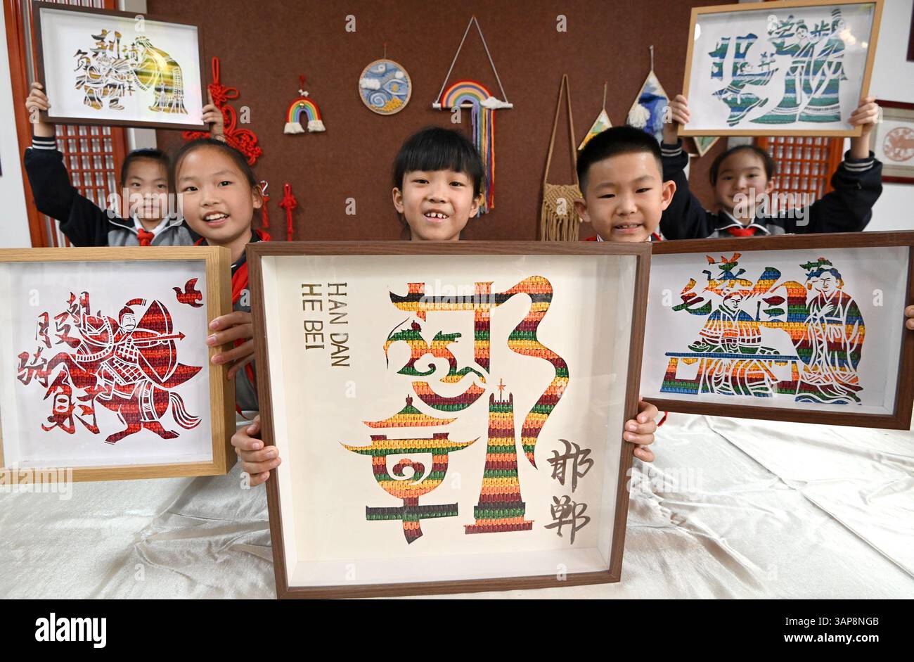 HANDAN, CHINA - APRIL 16, 2025 - Students weave knot crafts at Railway ...