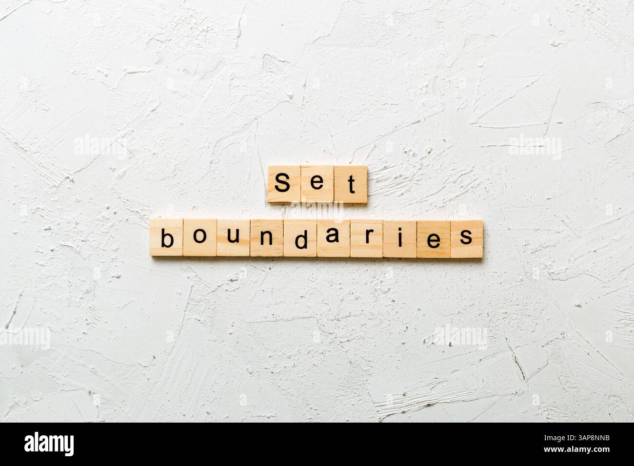 set boundaries word written on wood block. set boundaries text on table ...