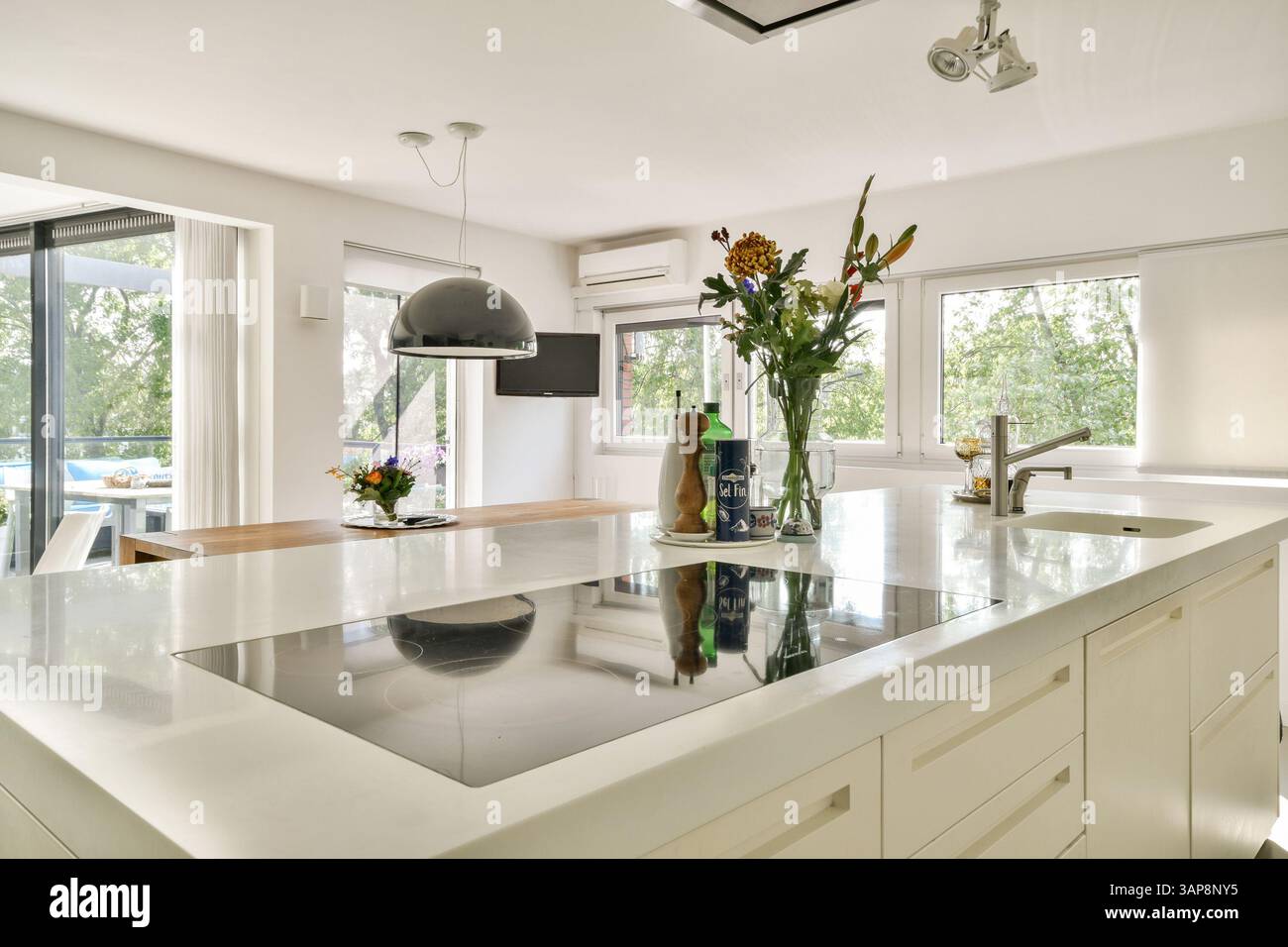 Bright and airy kitchen featuring a contemporary design with elegant ...