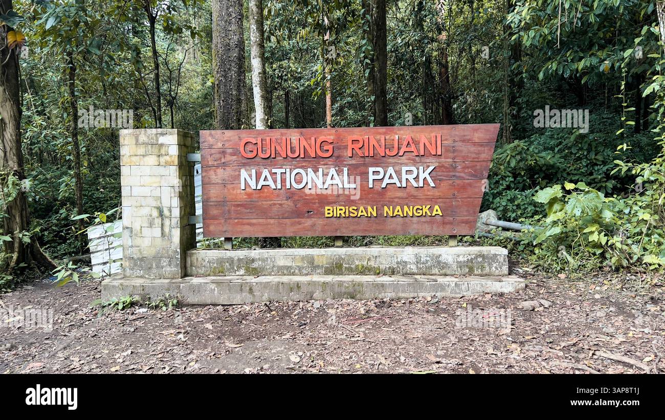 Mount Rinjani National Park sign in front of the hiking and summit ...