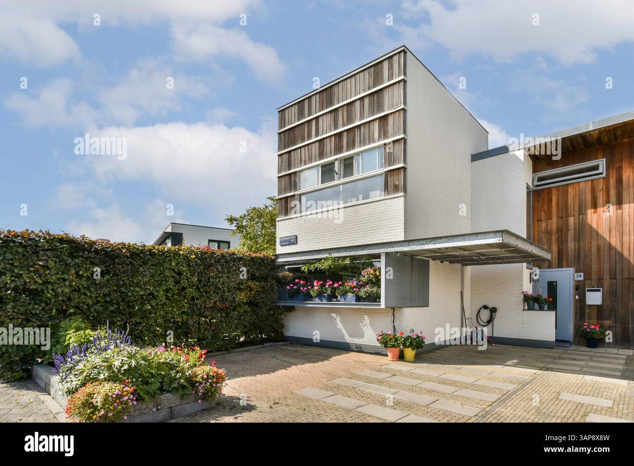 A contemporary architectural design featuring clean lines, large ...